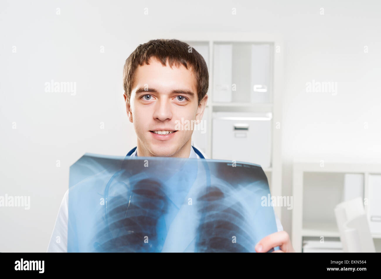 Doctor looking the x-ray Stock Photo - Alamy