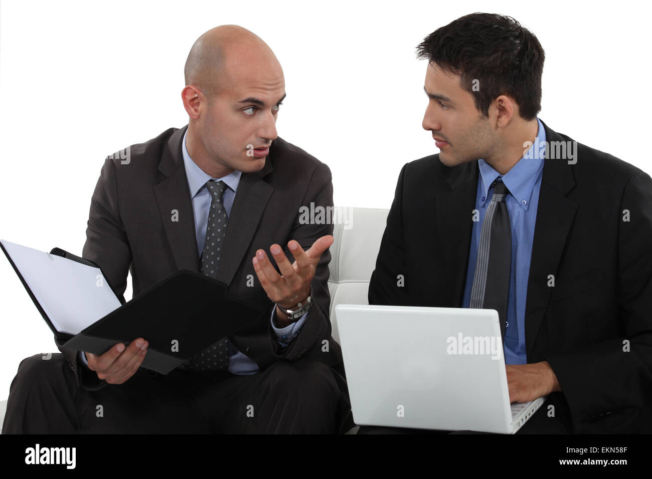 Men discussing a business proposition Stock Photo - Alamy