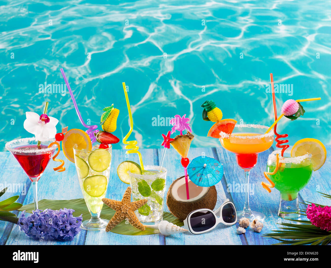 Colorful many tropical Cocktails in tropical blue wood Stock Photo - Alamy