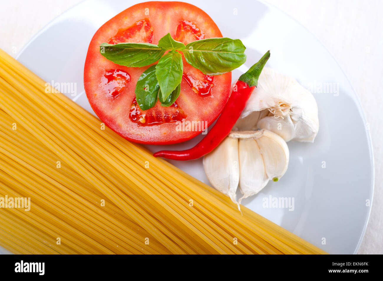 Italian spaghetti pasta tomato ingredients Stock Photo - Alamy