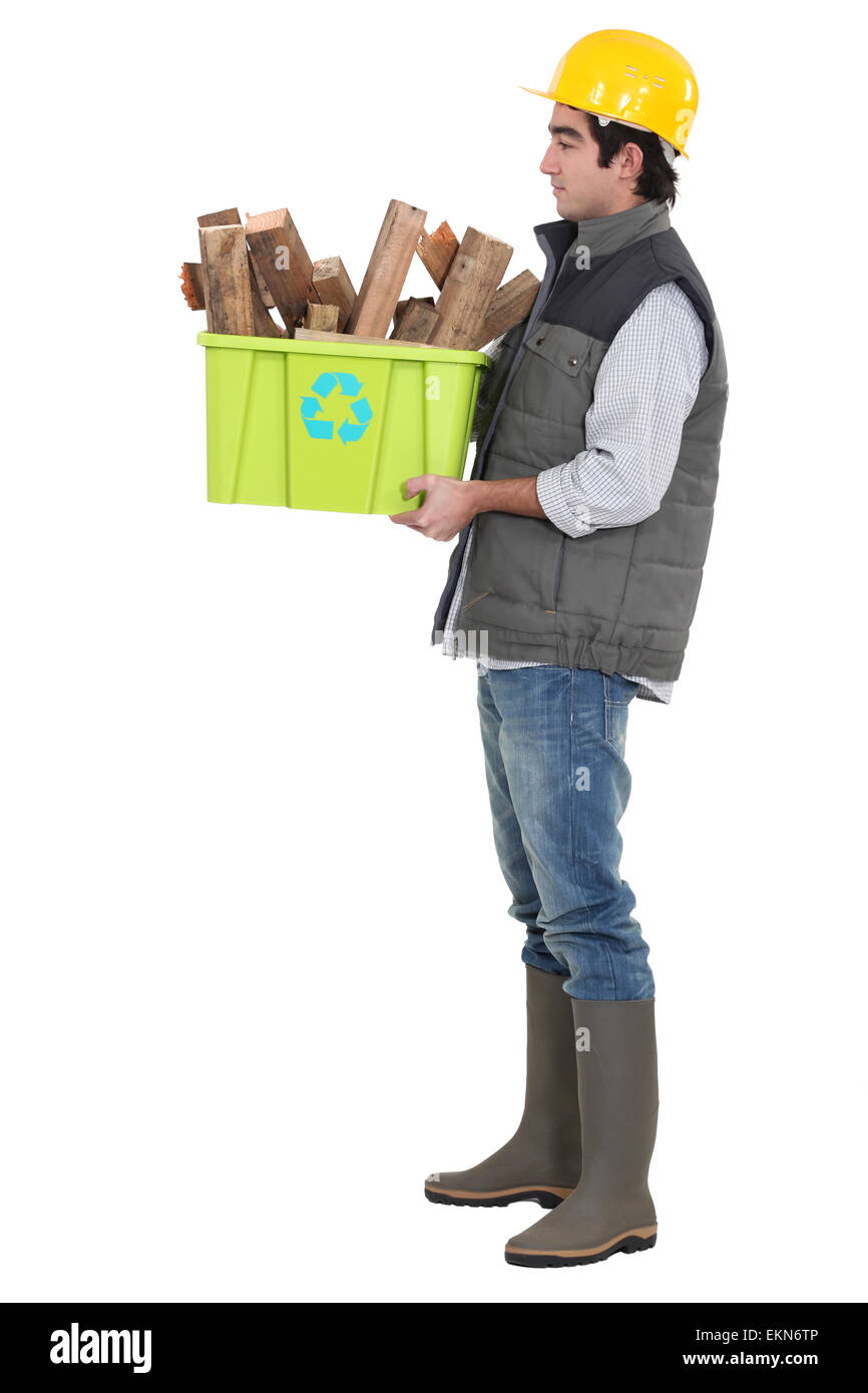 Man recycling wood Stock Photo - Alamy