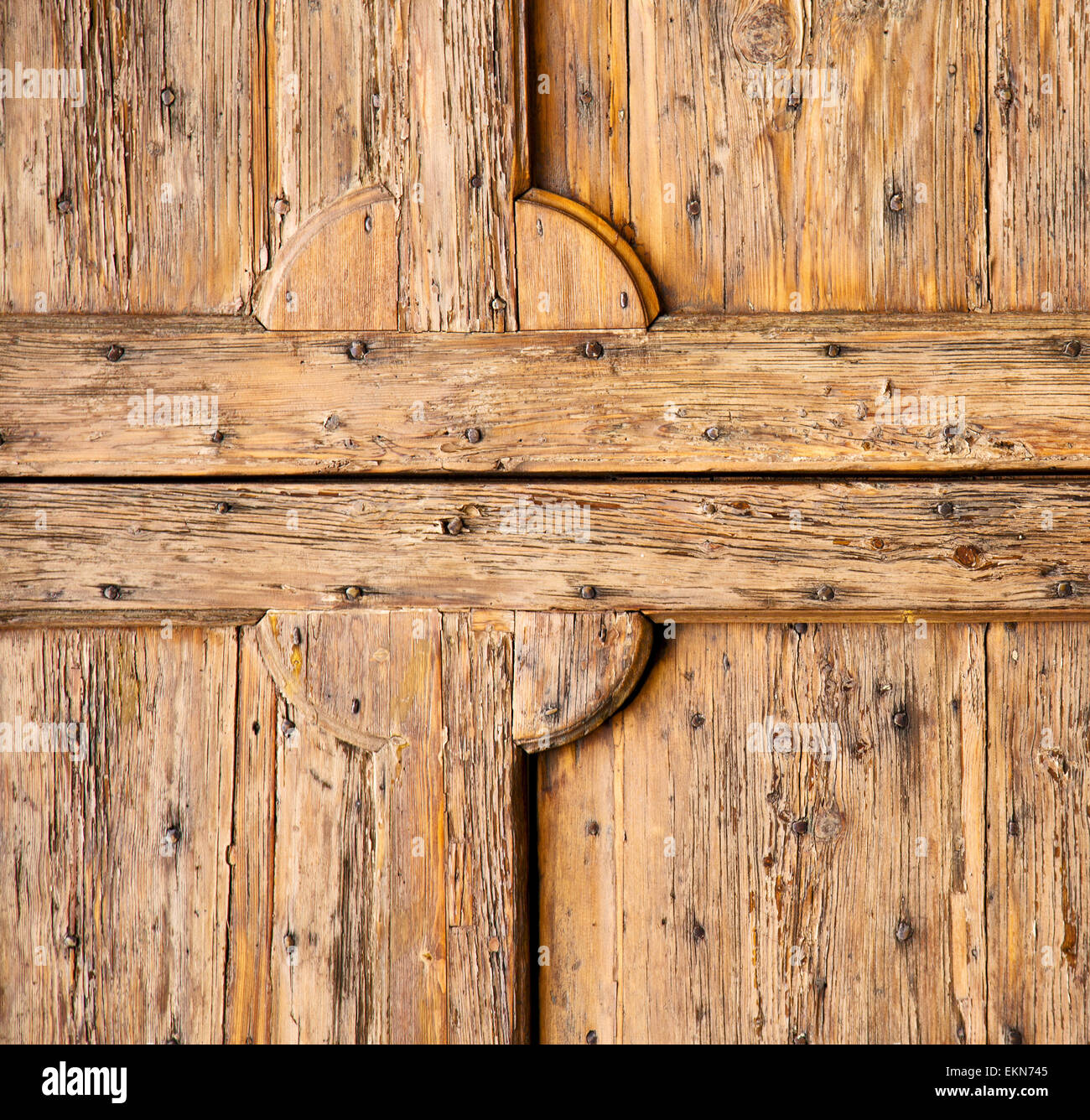 cavaria abstract rusty brass brown knocker in a door curch closed wood ...