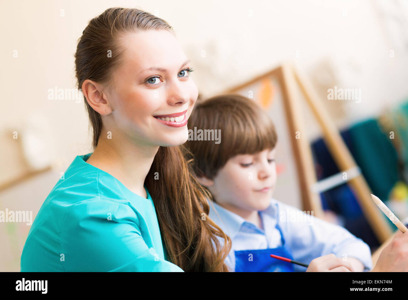 teacher and student in the classroom Stock Photo - Alamy