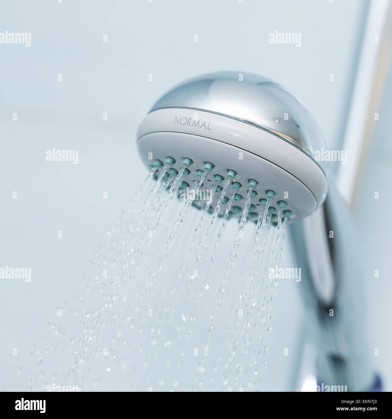 Silver shower with flowing water Stock Photo - Alamy