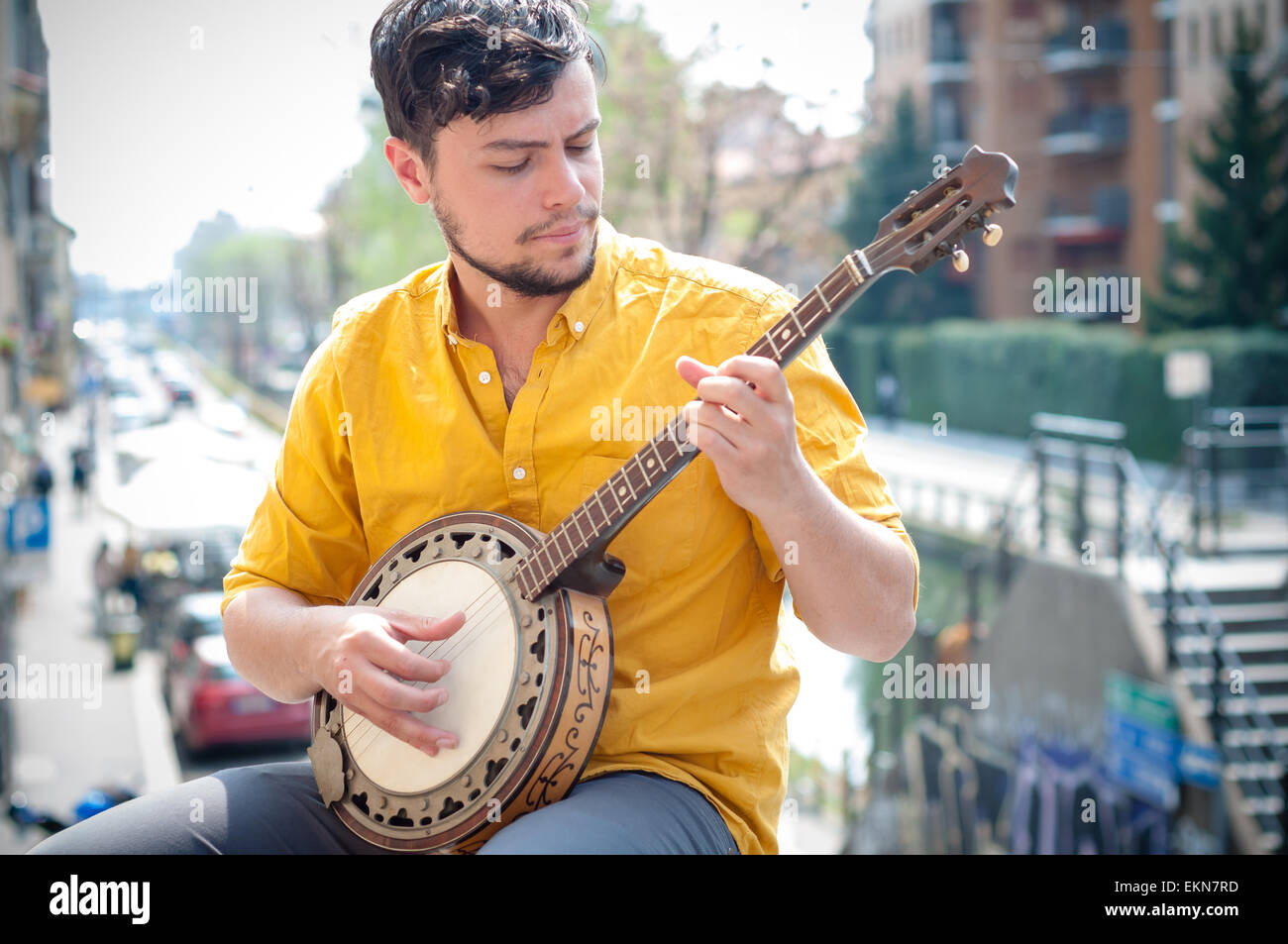 Musician man banjo playing hi-res stock photography and images - Alamy