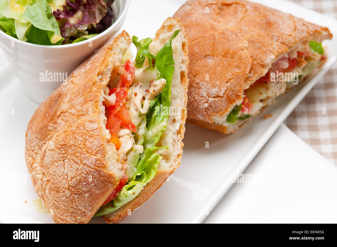 ciabatta panini sandwich with chicken and tomato Stock Photo - Alamy