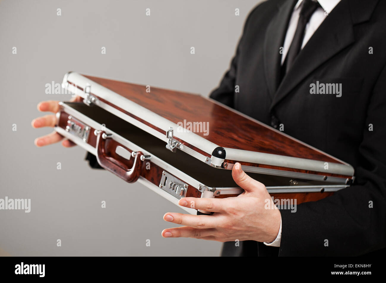 Document case in businessman hands Stock Photo - Alamy