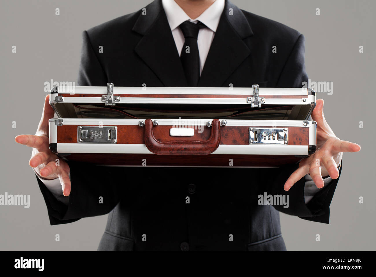 Document case in businessman hands Stock Photo - Alamy