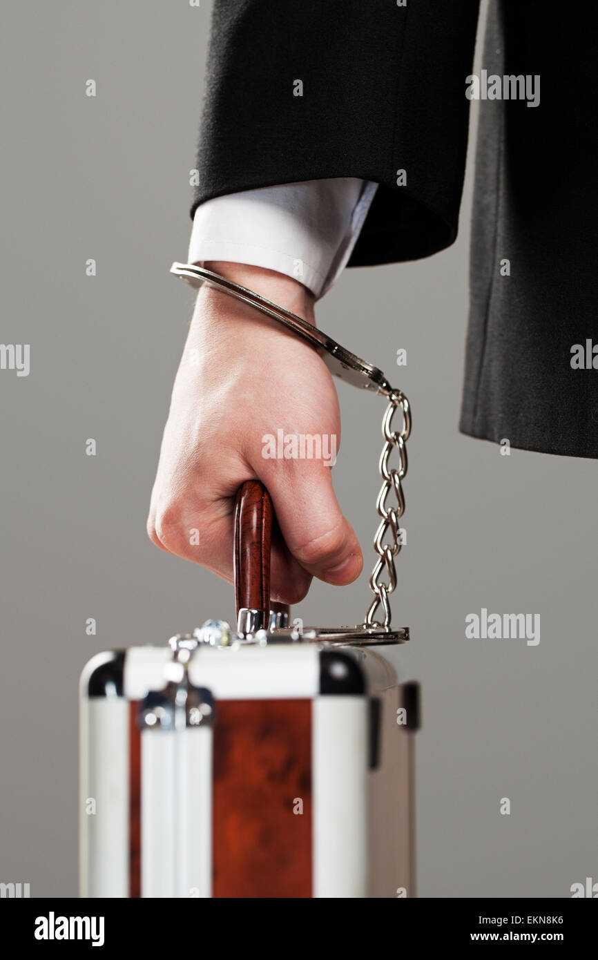 Metal suitcase handcuffs hi-res stock photography and images - Alamy