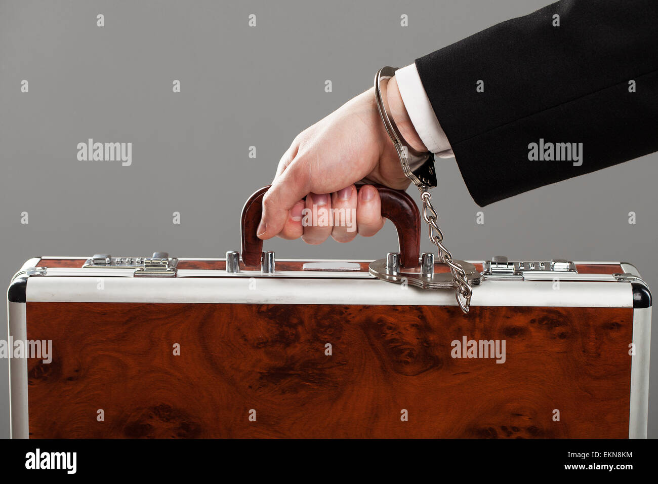 Metal suitcase handcuffs hi-res stock photography and images - Alamy