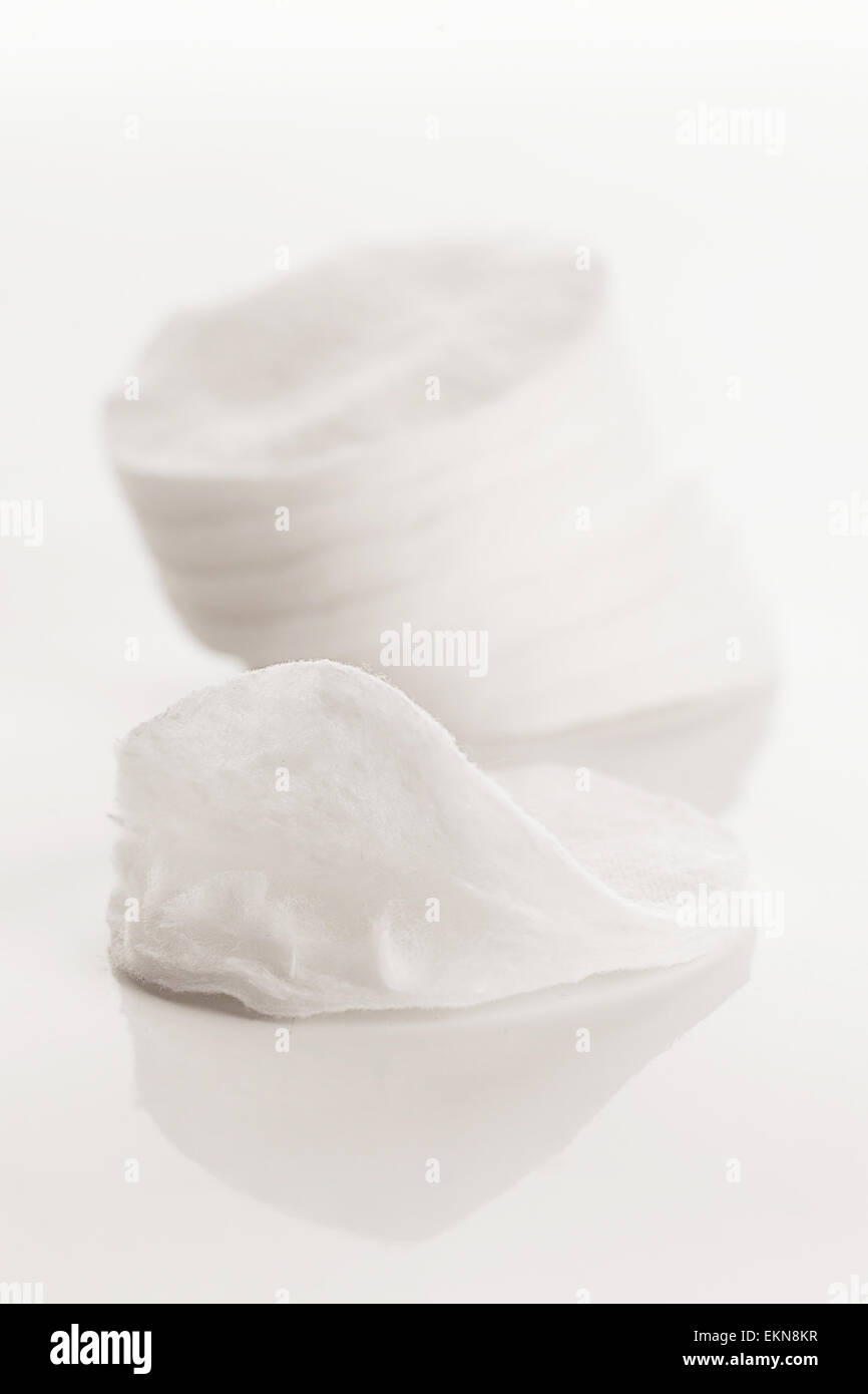 White casual cotton pads on a white background Stock Photo - Alamy