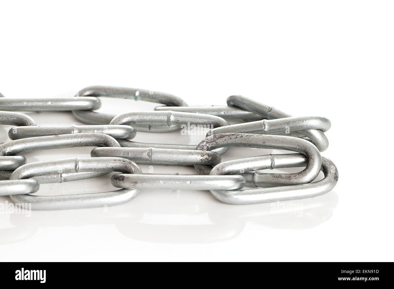 Silver metal chain on a background Stock Photo - Alamy