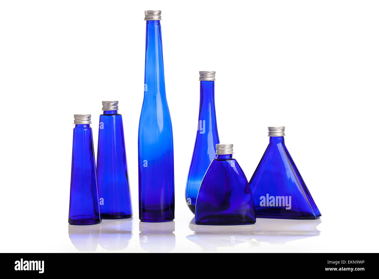 Little blue bottles isolated Stock Photo - Alamy