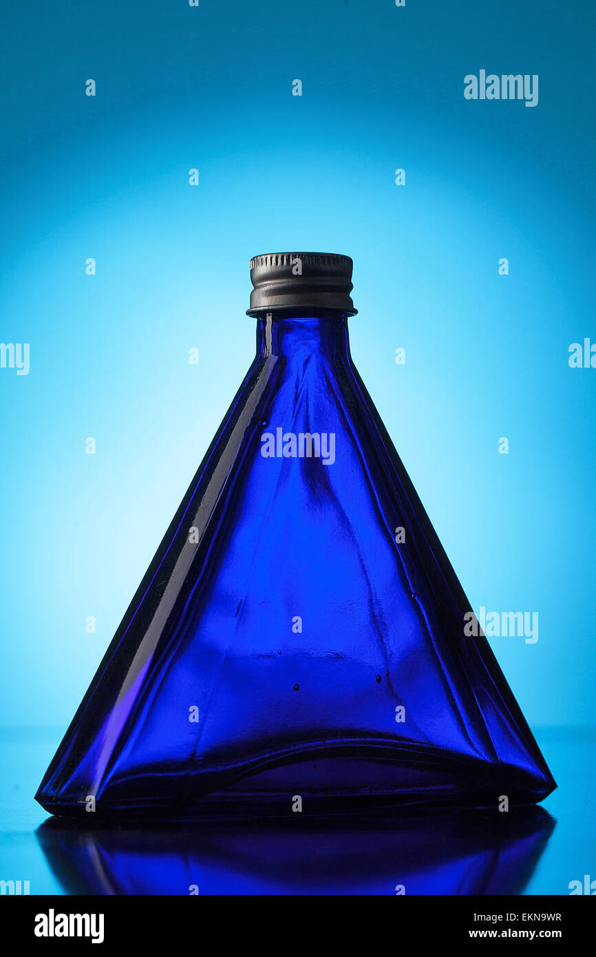 Little blue bottles on a background Stock Photo - Alamy