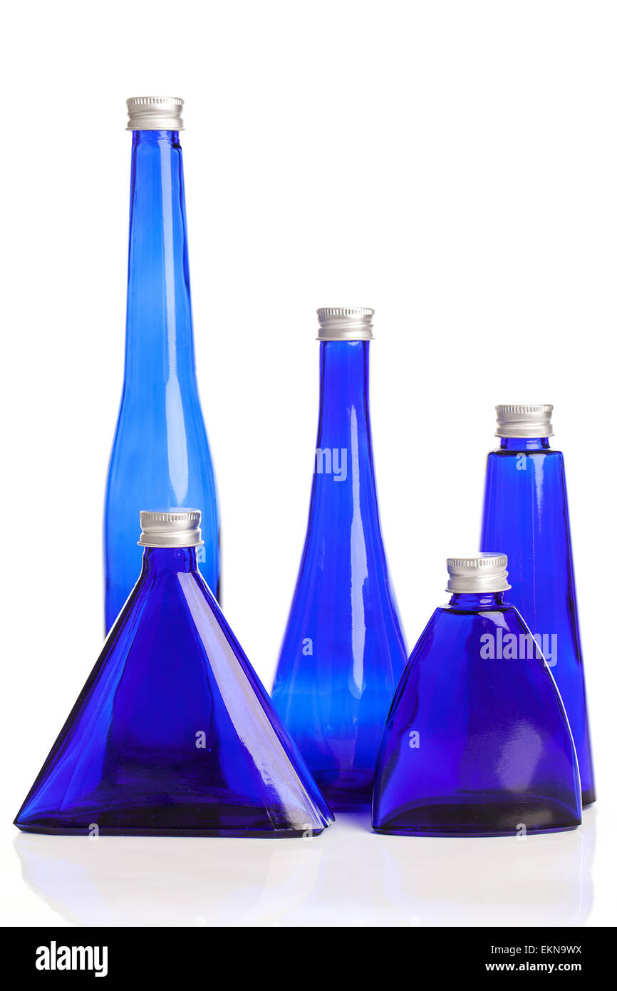 Little blue bottles isolated Stock Photo - Alamy