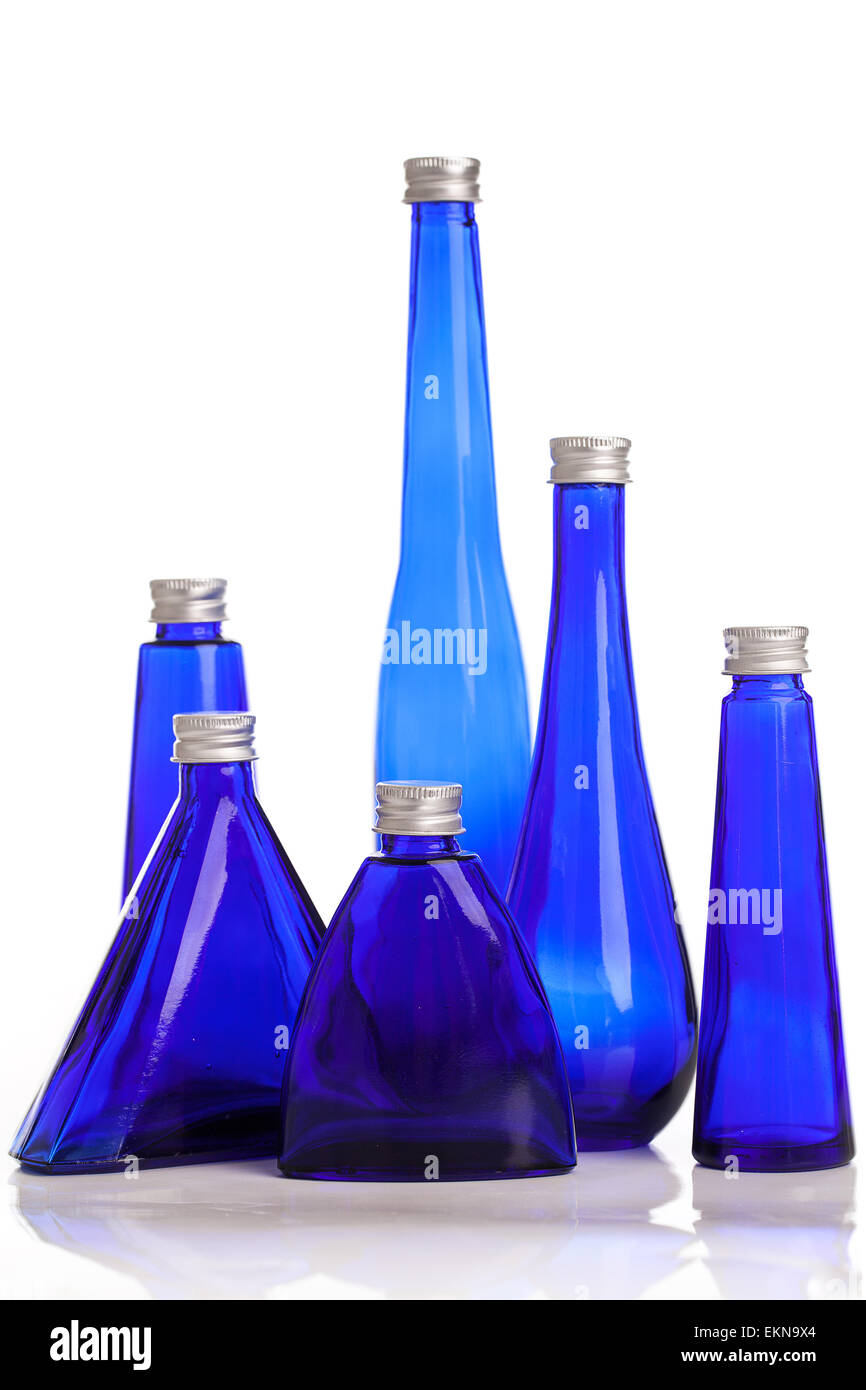 Little blue bottles isolated Stock Photo - Alamy