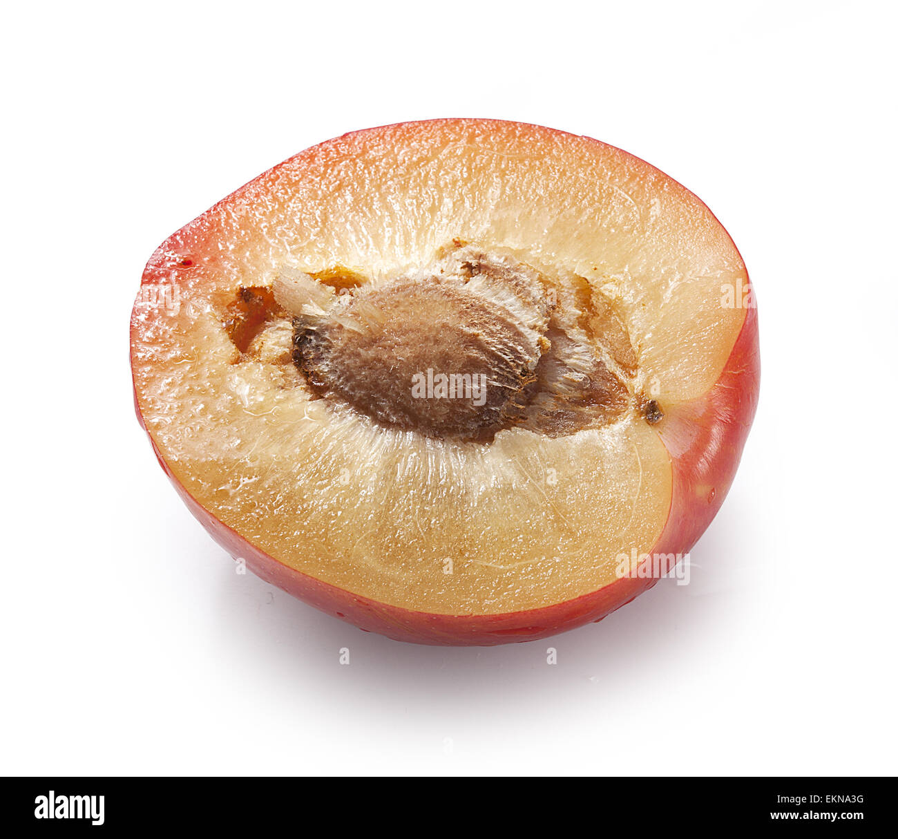Plum half fruit on Cut Out Stock Images & Pictures - Alamy