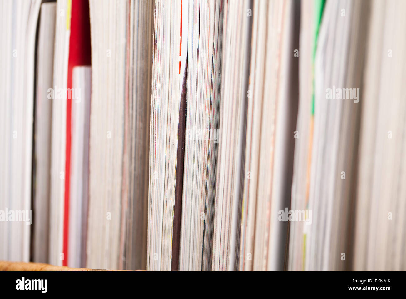 Pile of colorful magazines on a table Stock Photo - Alamy
