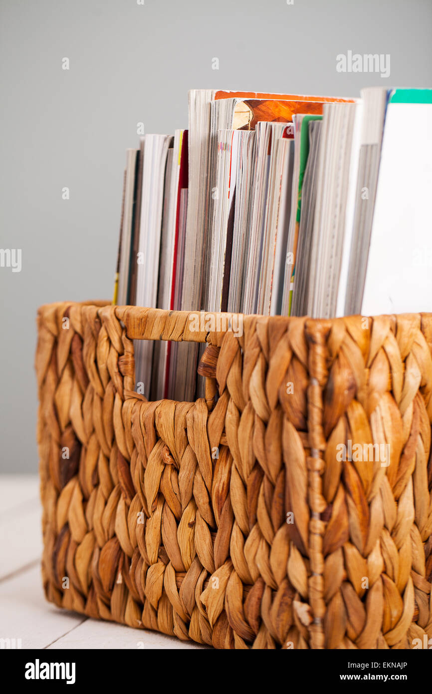 Closeup image of magazines in a box Stock Photo - Alamy