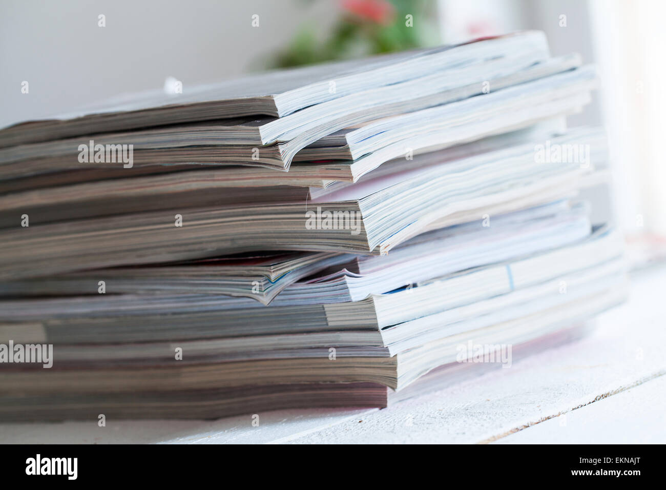 Pile of colorful magazines on a table Stock Photo - Alamy