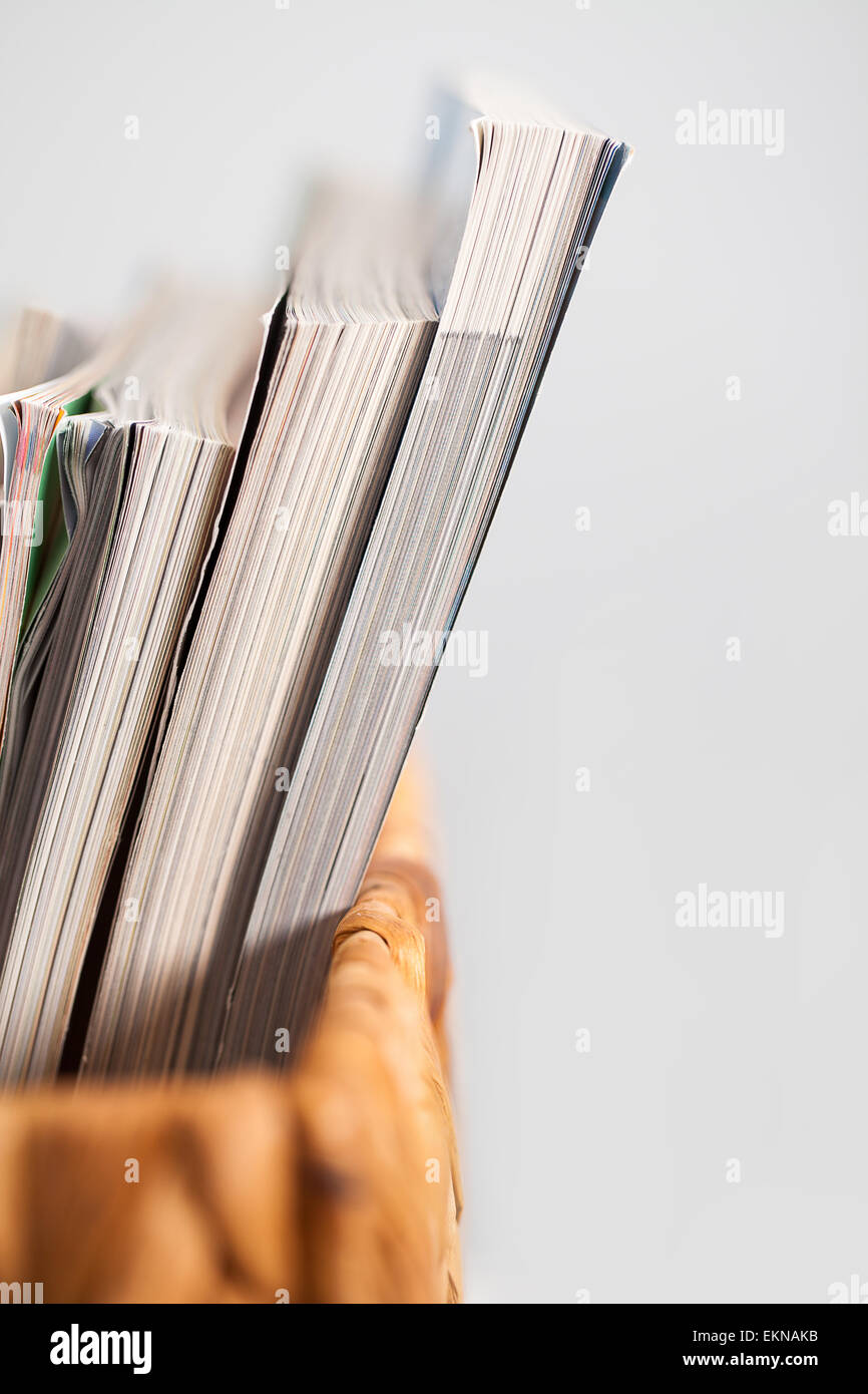 Closeup image of magazines in a box Stock Photo - Alamy