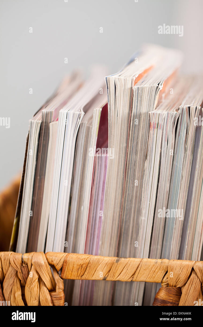 Closeup image of magazines in a box Stock Photo - Alamy