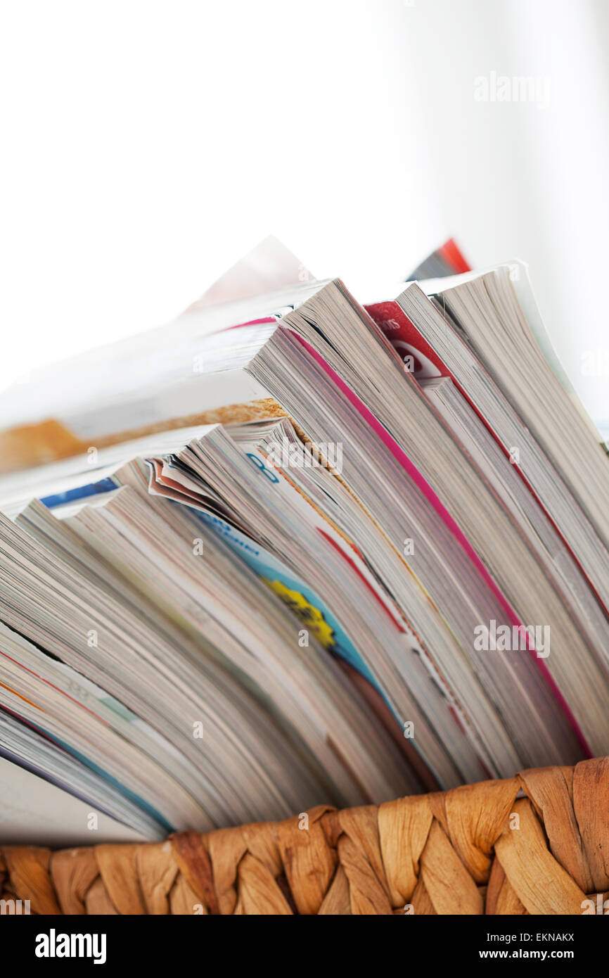 Closeup image of magazines in a box Stock Photo - Alamy