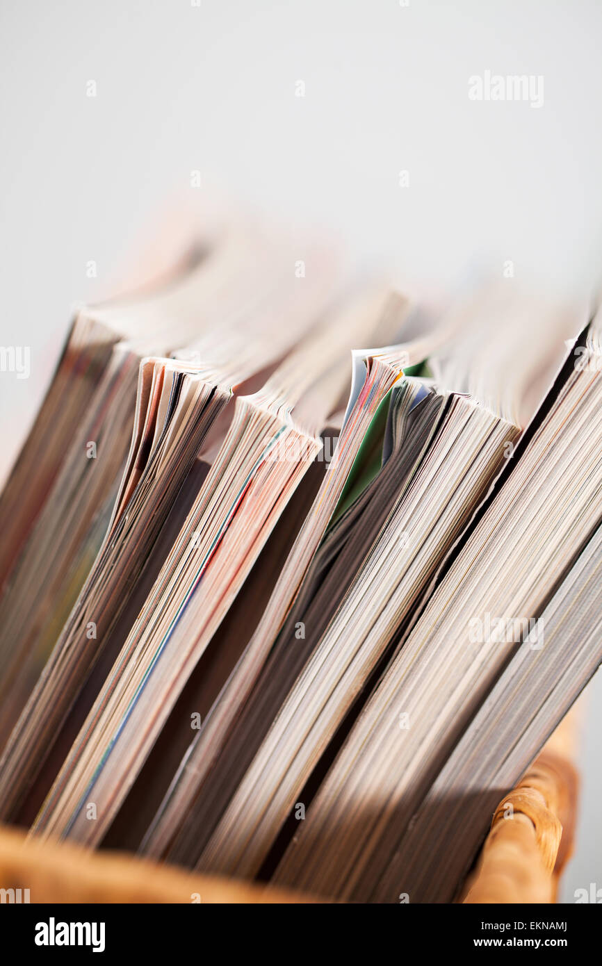 Closeup image of magazines in a box Stock Photo - Alamy