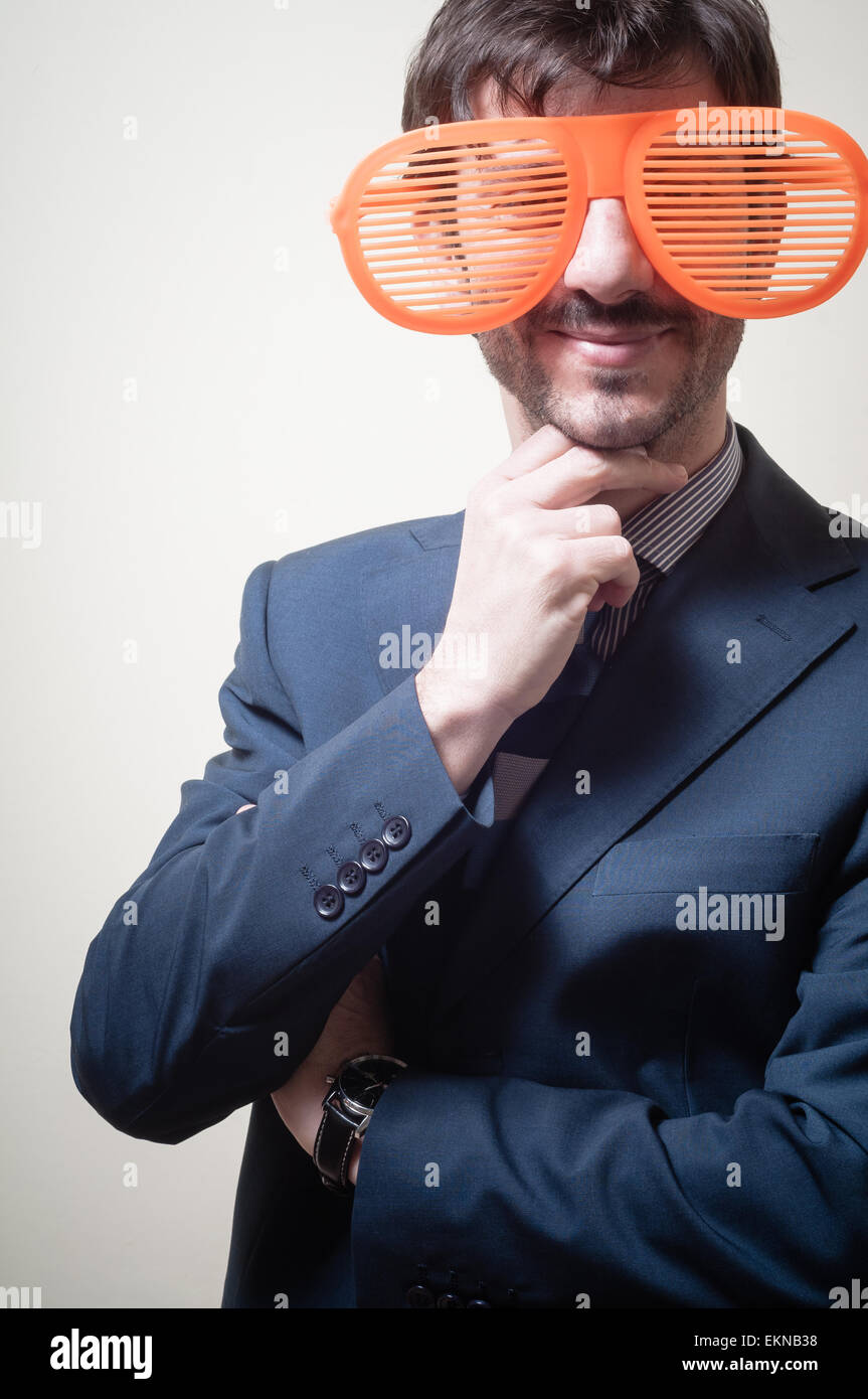 funny businessman with big orange glasses Stock Photo - Alamy