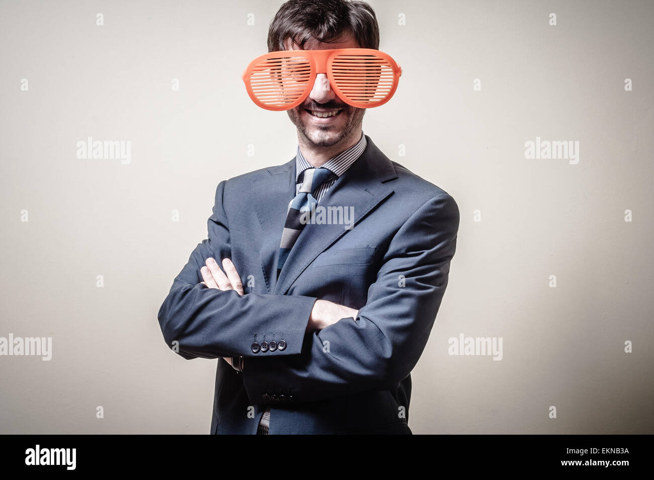 funny businessman with big orange glasses Stock Photo - Alamy