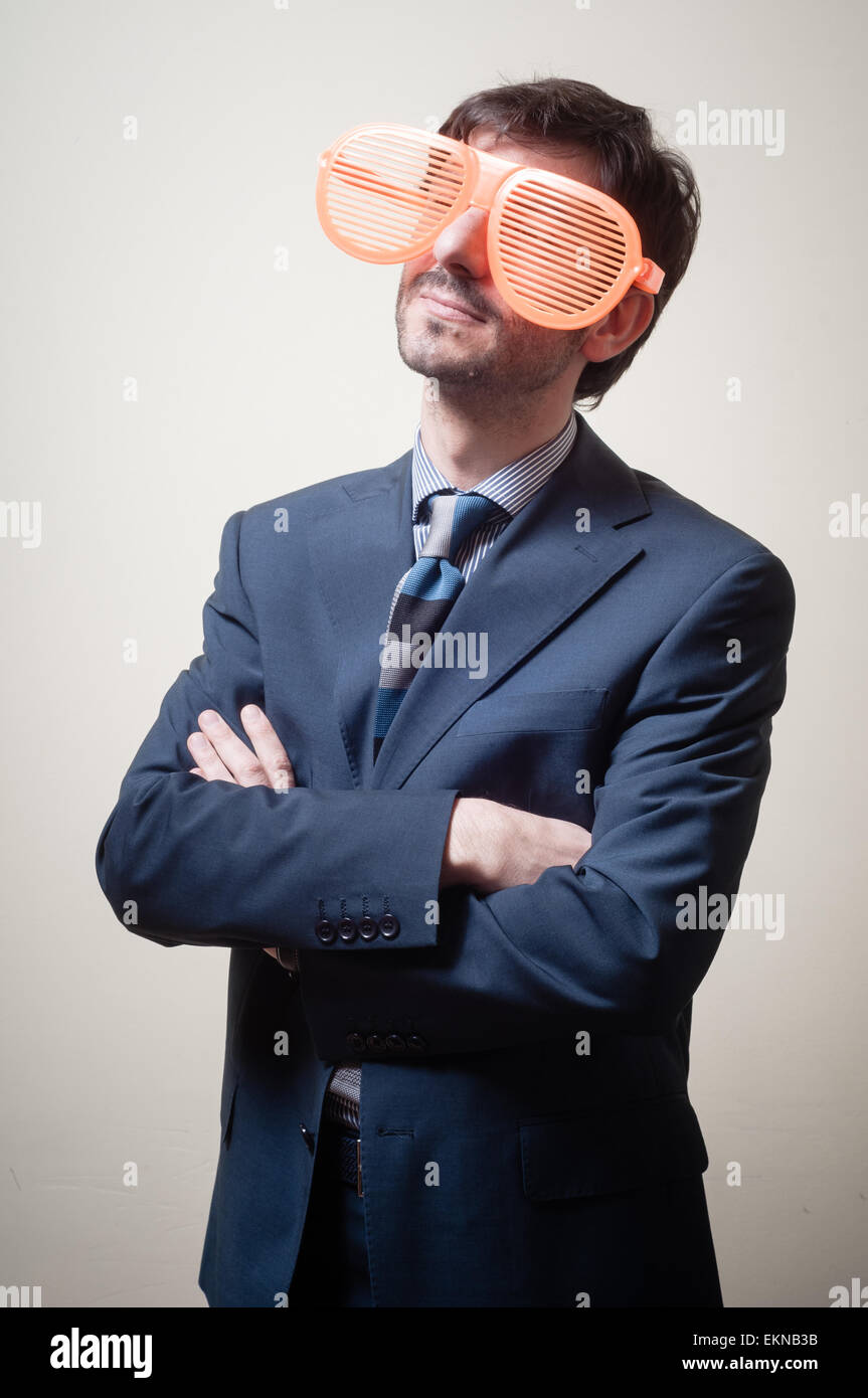 funny businessman with big orange glasses Stock Photo - Alamy