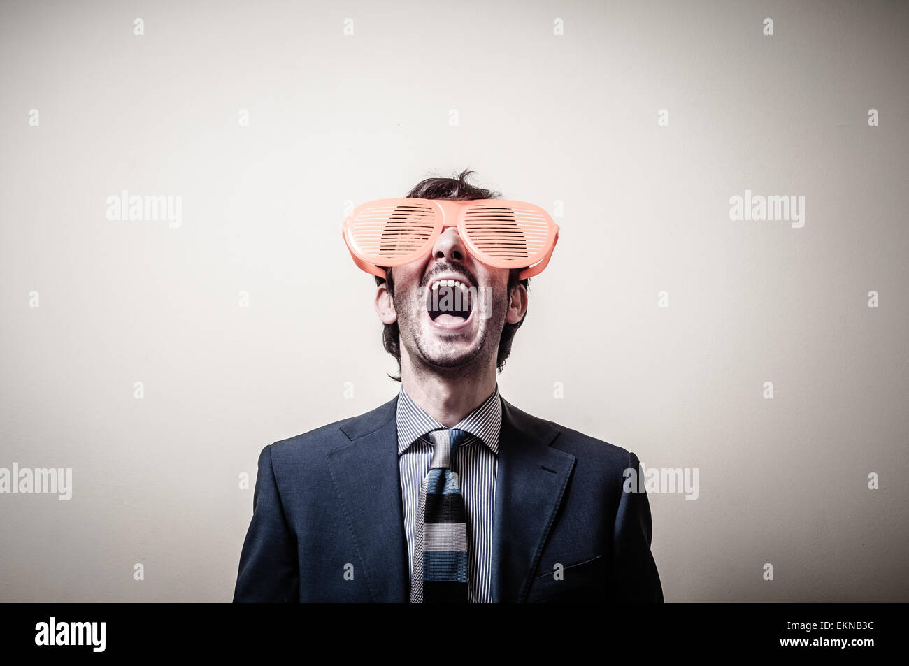 funny businessman with big orange glasses Stock Photo - Alamy