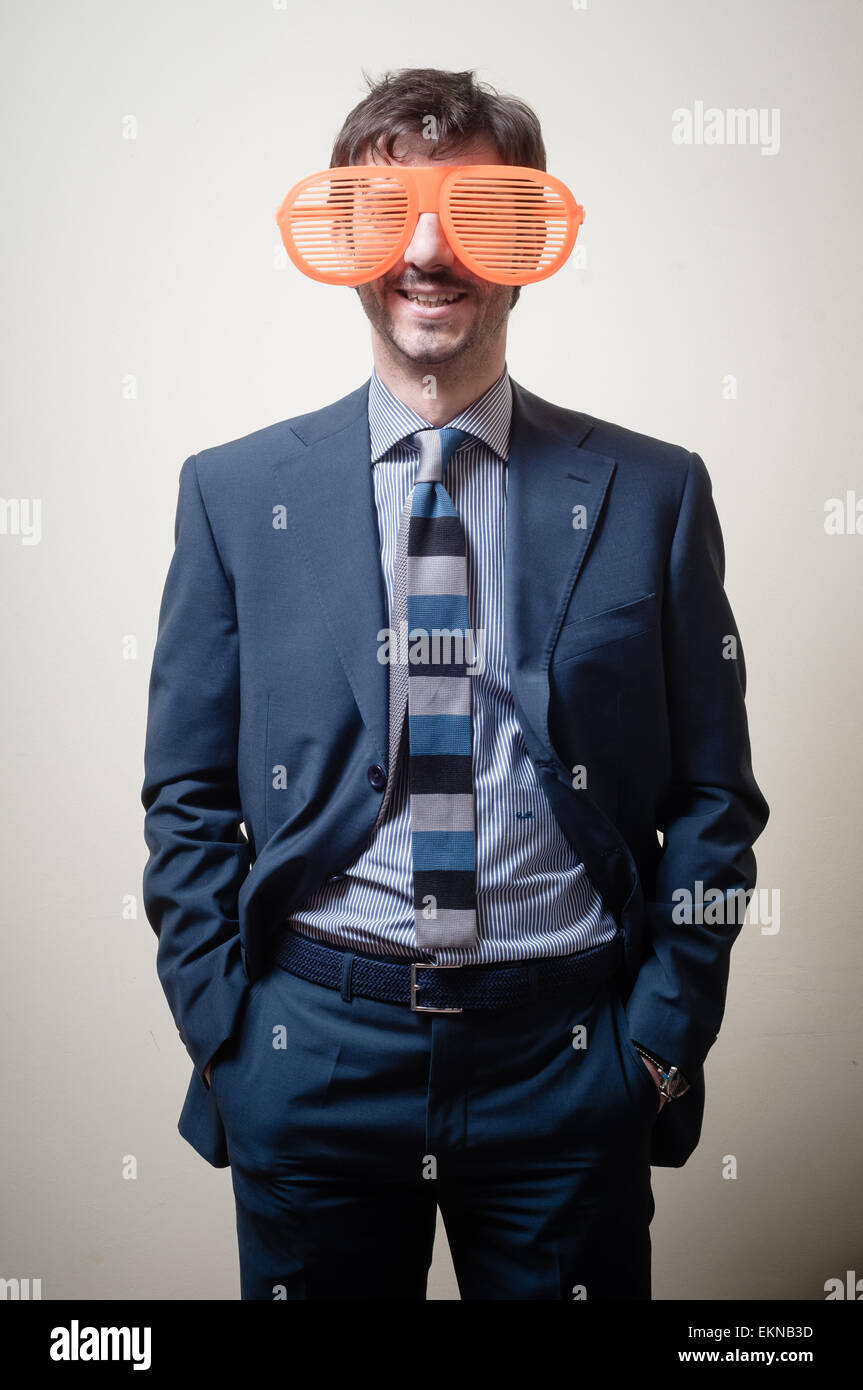 funny businessman with big orange glasses Stock Photo - Alamy