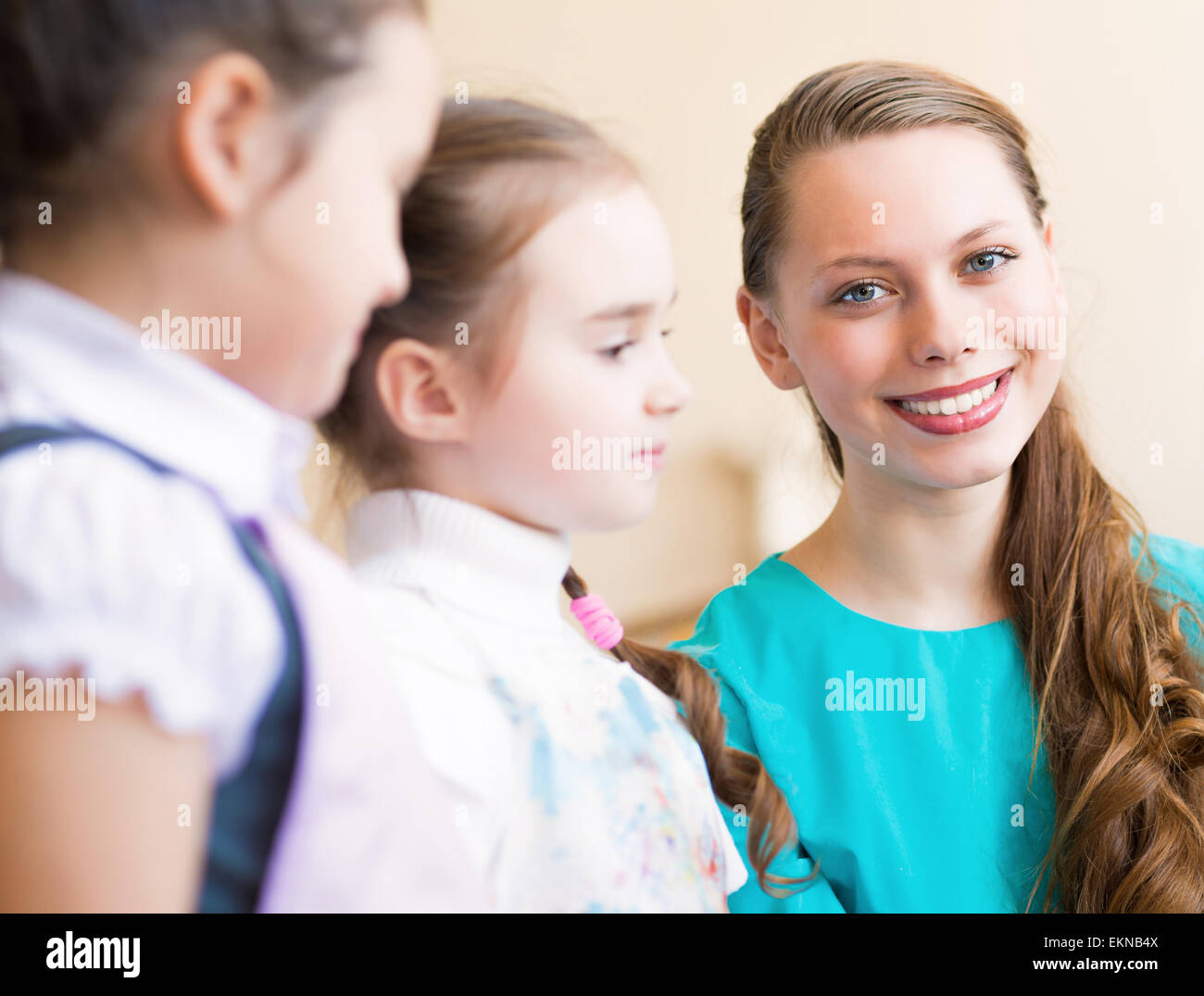 children draw with the teacher Stock Photo - Alamy