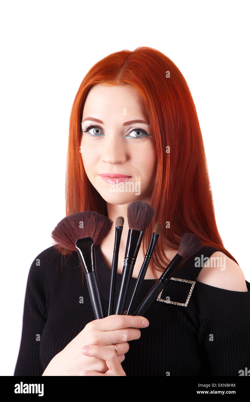 Girl makeup artist with brushes in hand Stock Photo - Alamy