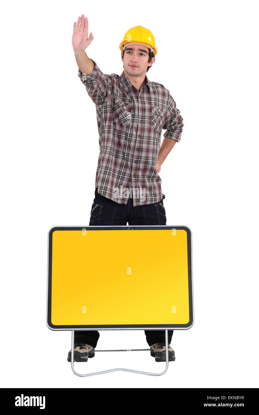 road worker making a stop sign with his hand Stock Photo - Alamy