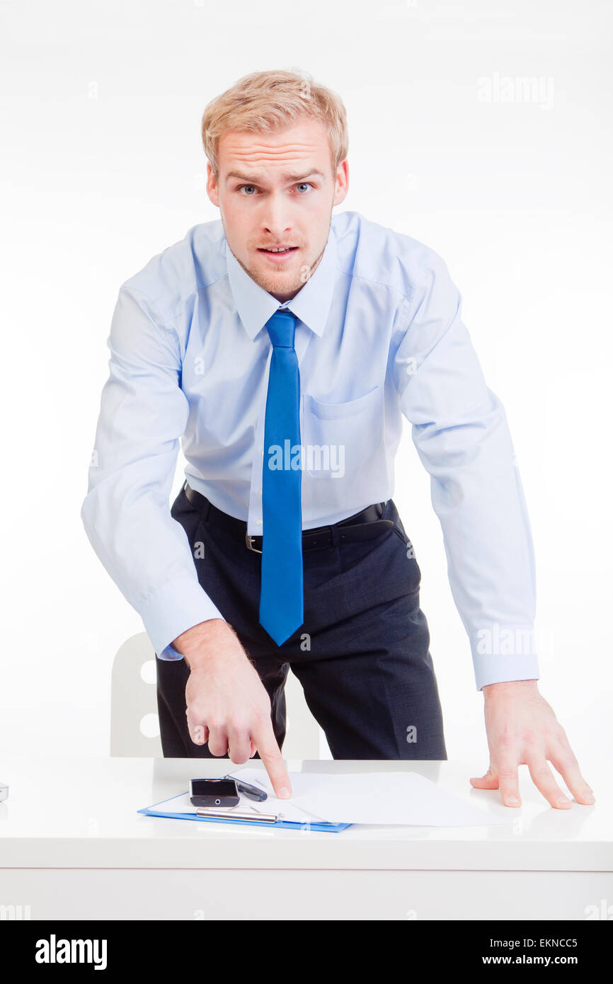 Angry boss standing behind desk hi-res stock photography and images - Alamy