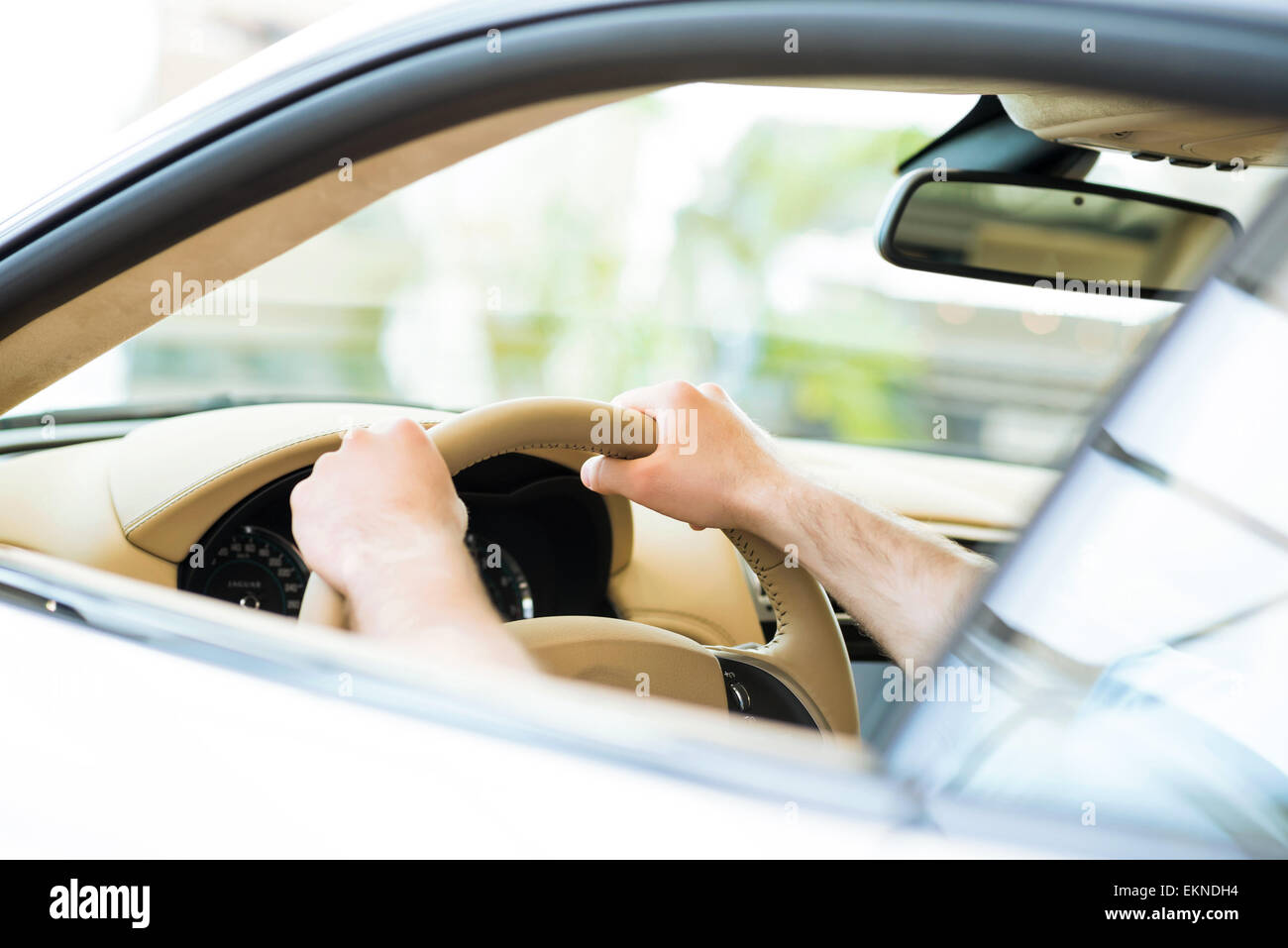 Hand gripping steering wheel car hi-res stock photography and images ...