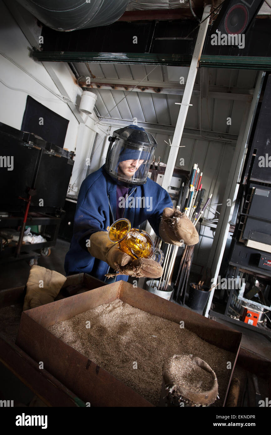 Worker With Glass Vase Stock Photo - Alamy