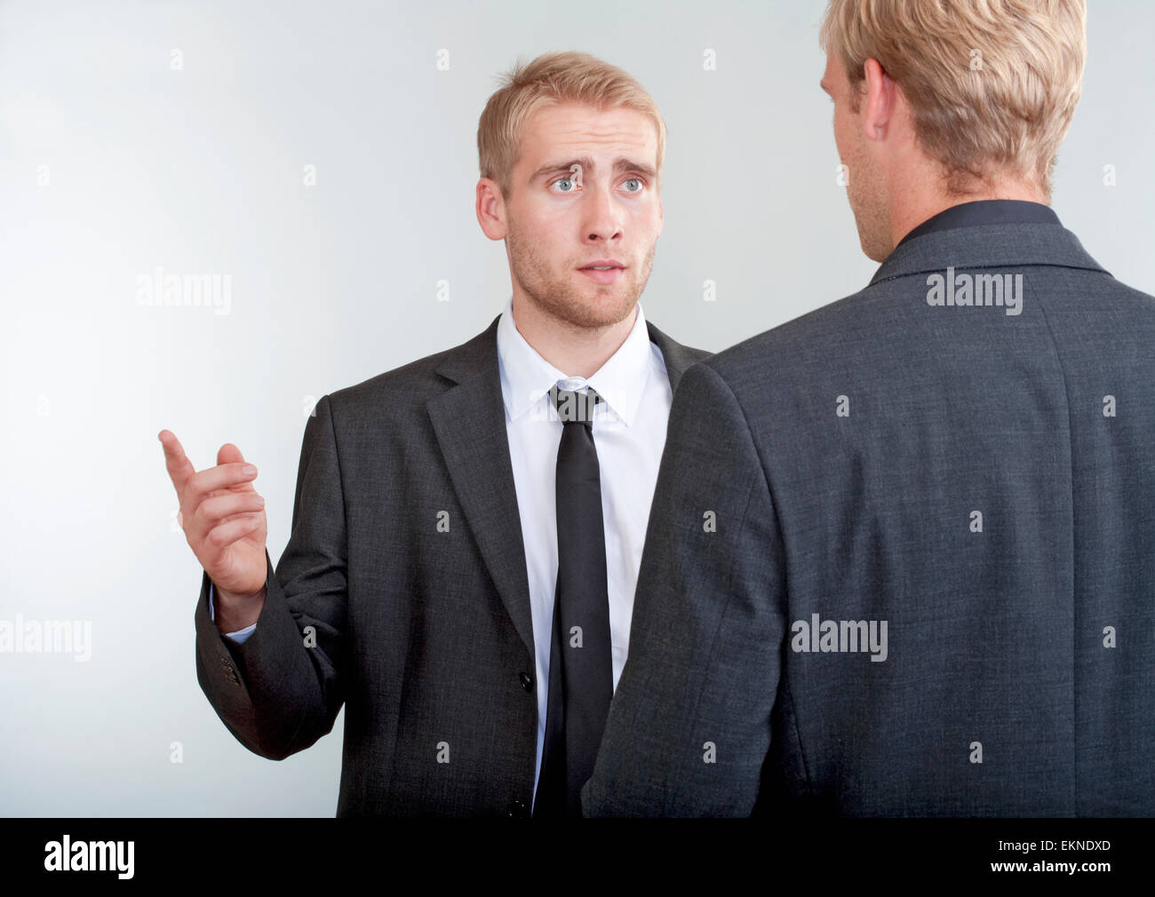 two businessmen discussing Stock Photo - Alamy two businessmen discussing Stock Photo - Alamy
