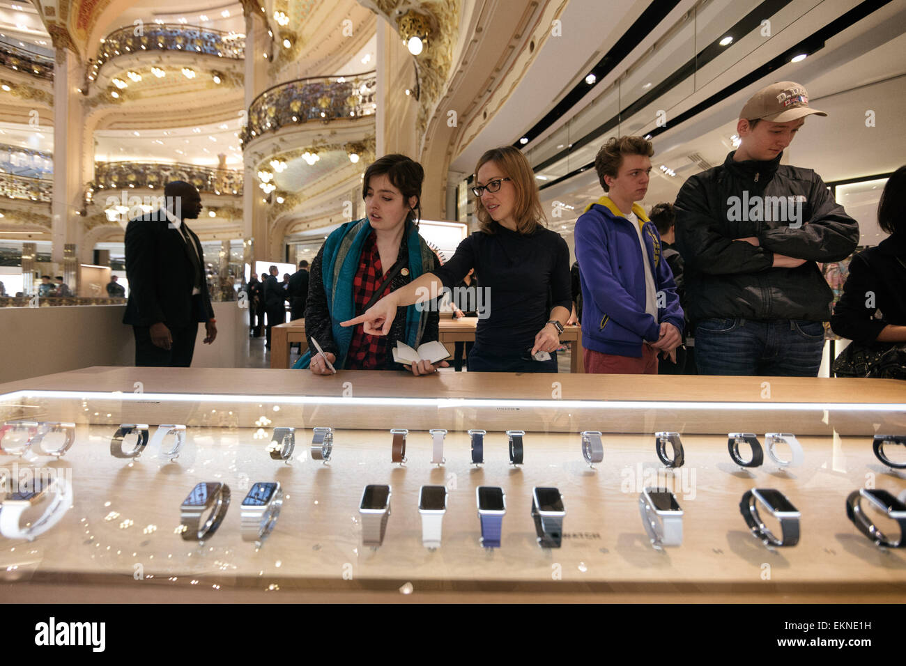 10 April 2015 – Paris, France An Apple employee shows the products to ...