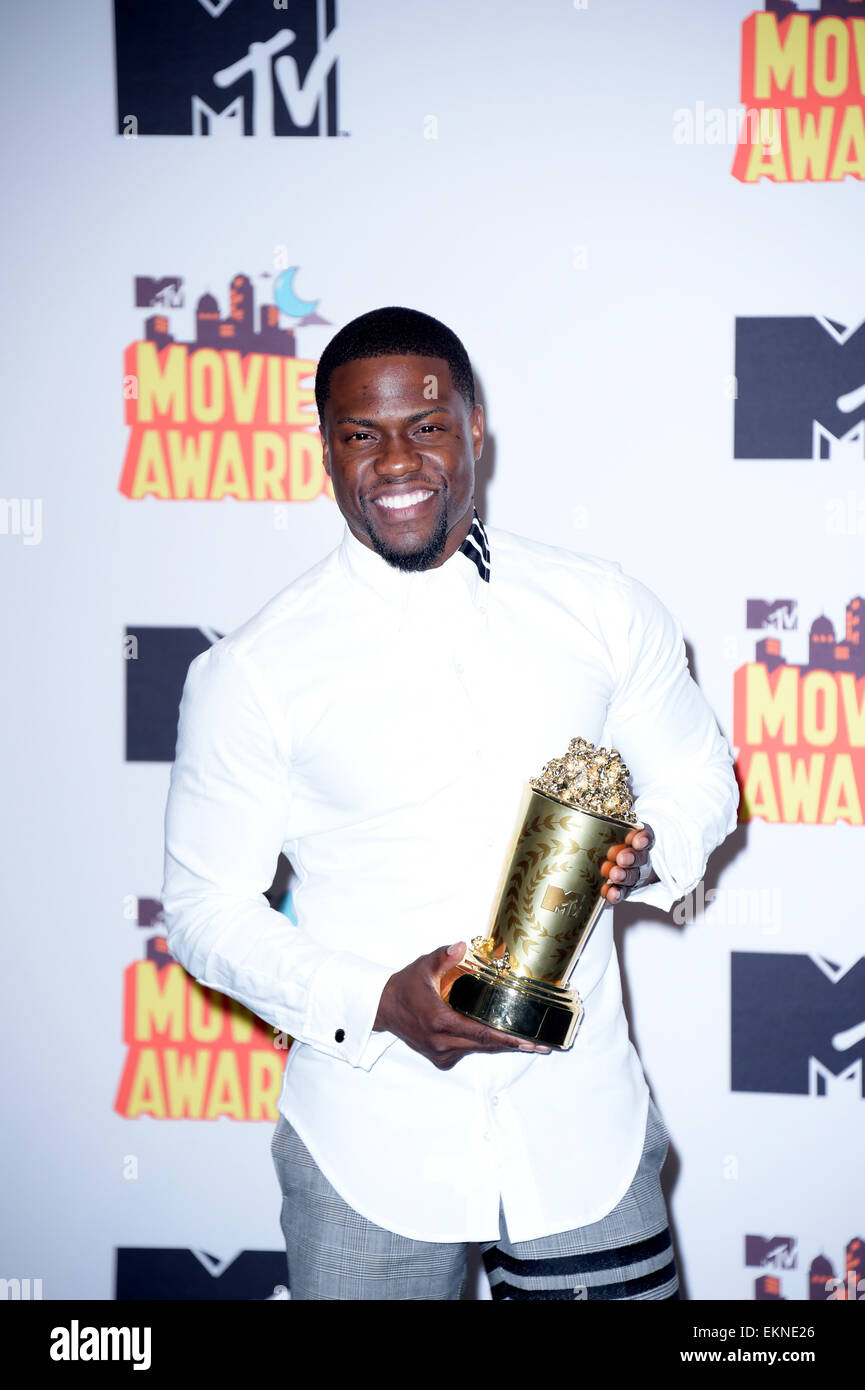 Actor Kevin Hart poses in the press room of The 2015 MTV Movie Awards ...