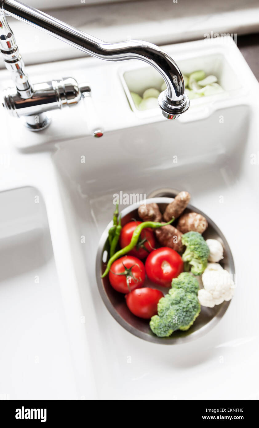 Modern Sink With Fresh Food Stock Photo - Alamy