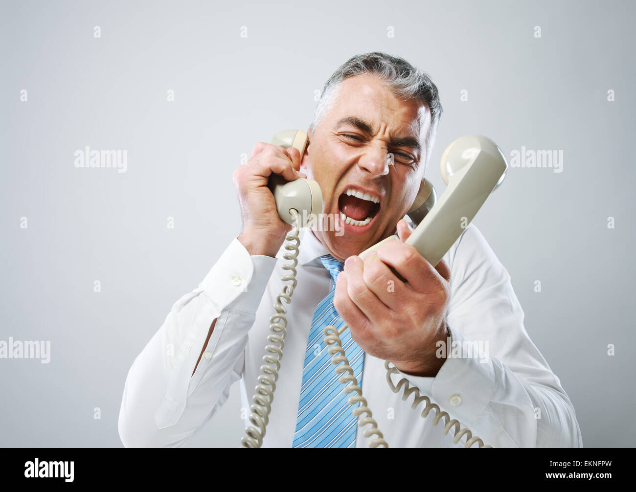 Stressed business man Stock Photo - Alamy