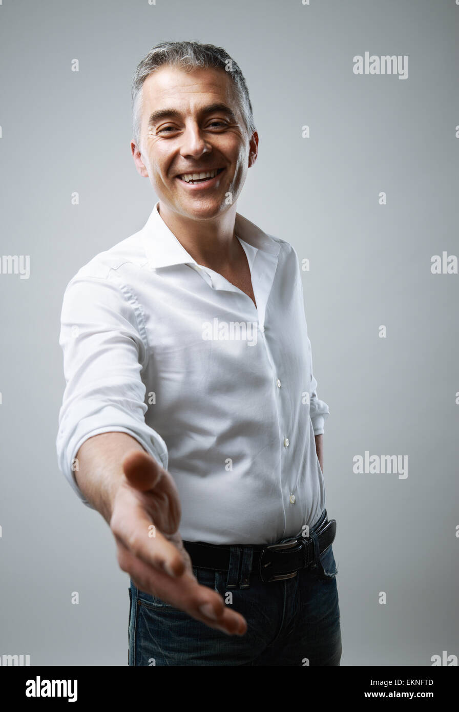 Mature businessman offering handshake hi-res stock photography and ...