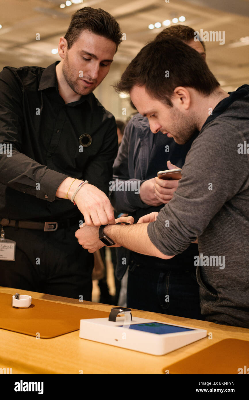 10 April 2015 – Paris, France Visitors try the Apple Watch in the Apple ...