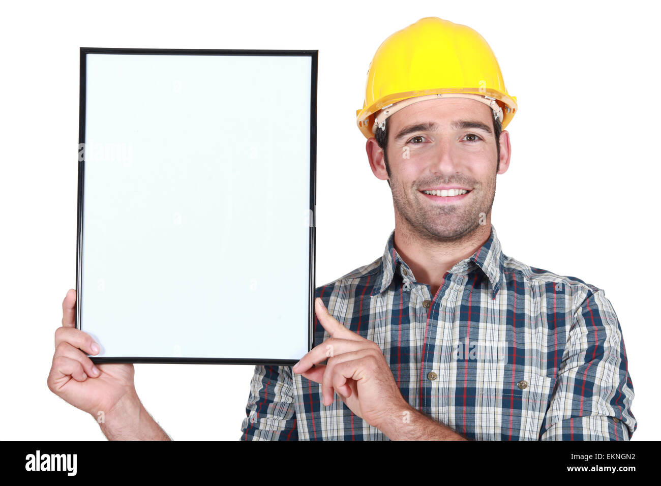 Construction worker holding up a blank bulletin board Stock Photo - Alamy