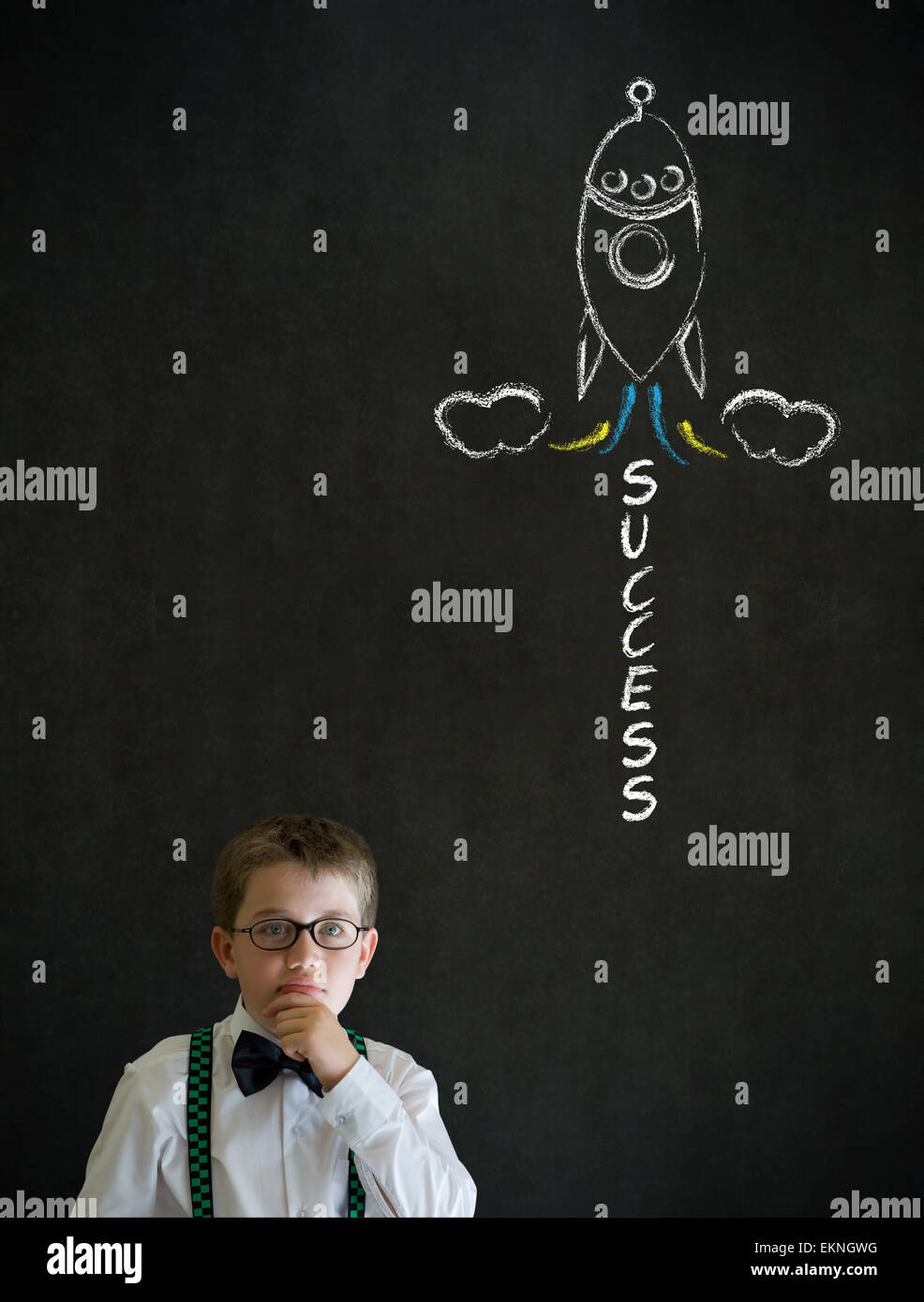 Thinking boy business man with chalk success rocket Stock Photo - Alamy