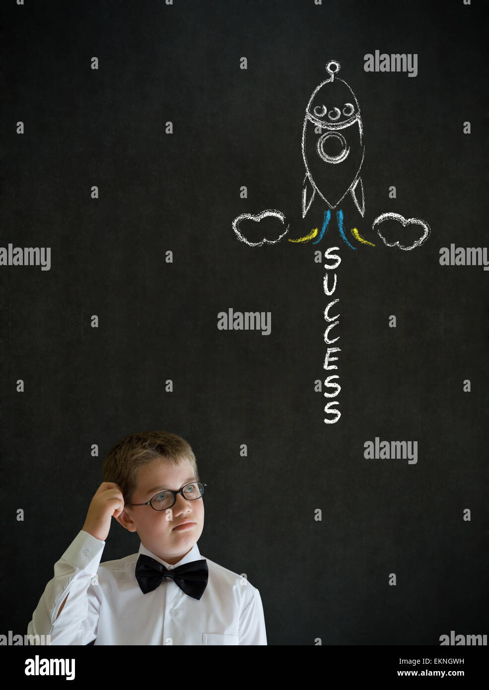 Scratching head thinking boy business man with chalk success rocket ...