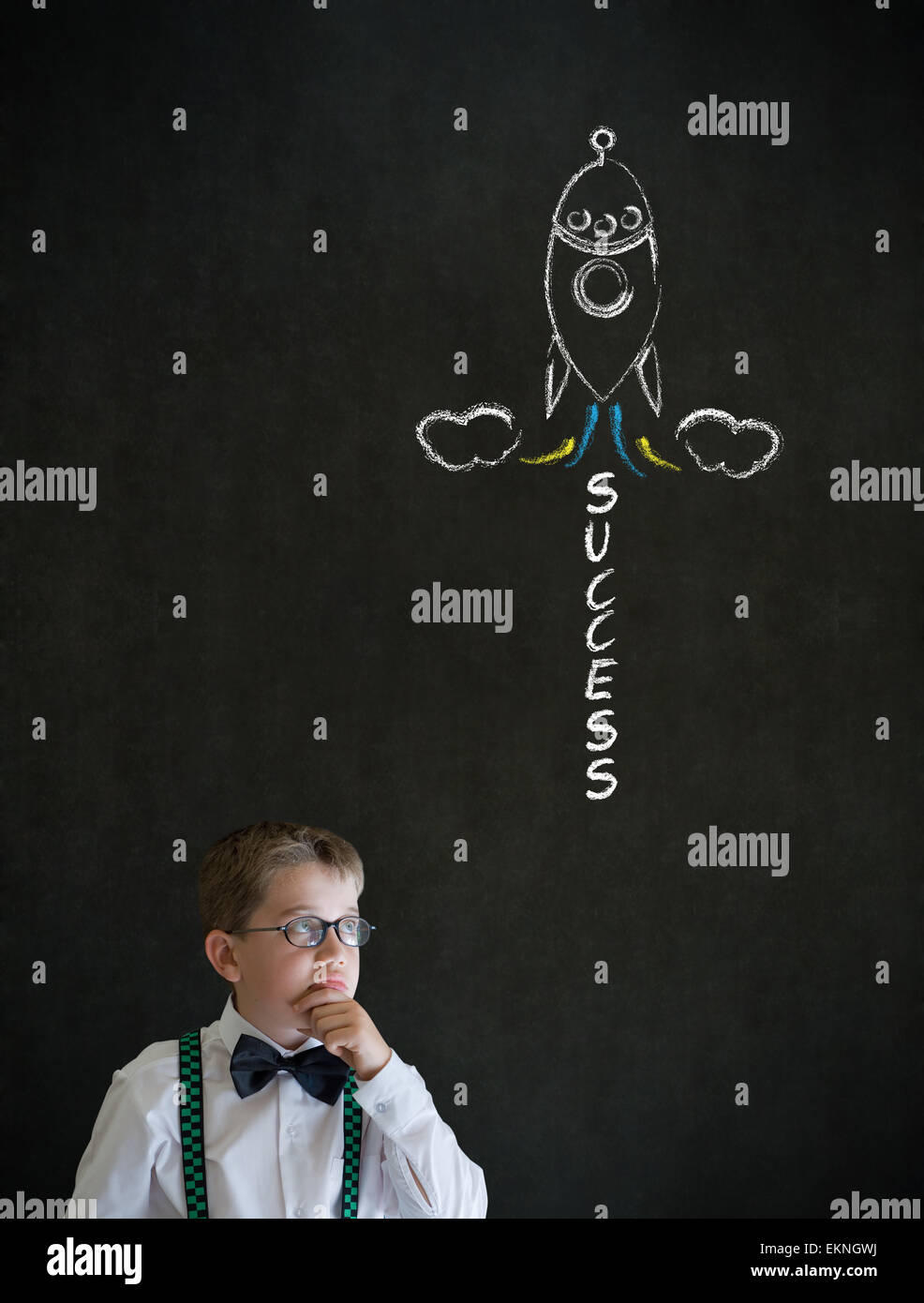 Thinking boy business man with chalk success rocket Stock Photo - Alamy